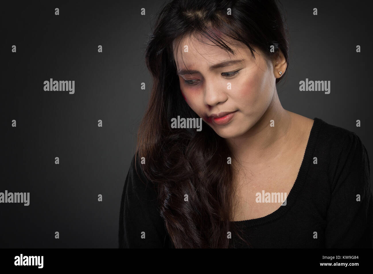portrait of a asian woman victim of domestic abuse Stock Photo - Alamy