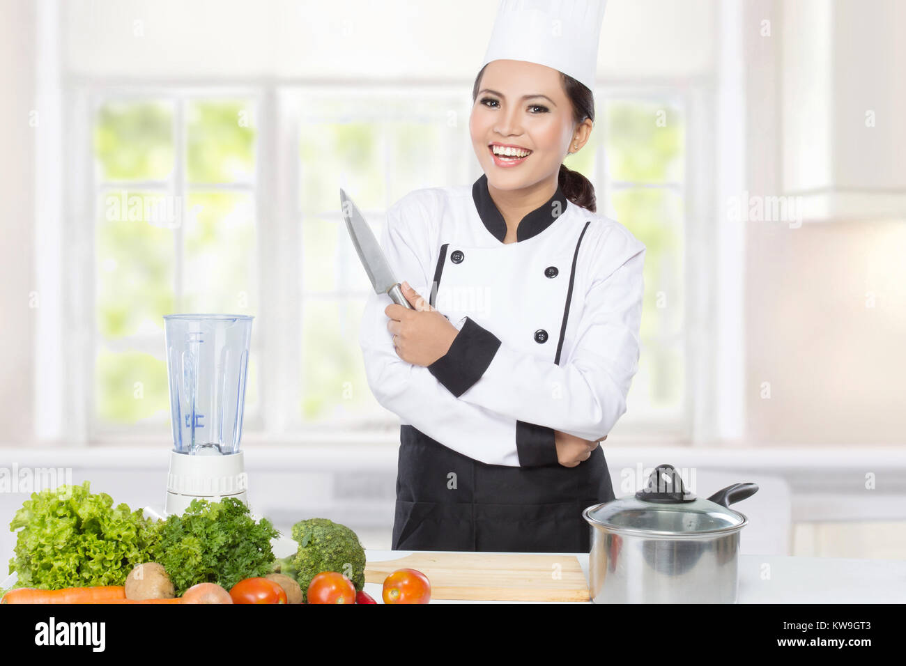 female chef Cooking in the kitchen. Healthy Food Diet. Prepare Food ...