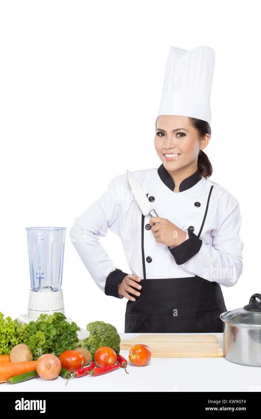 female chef Cooking in the kitchen. Healthy Food Diet. Prepare Food ...