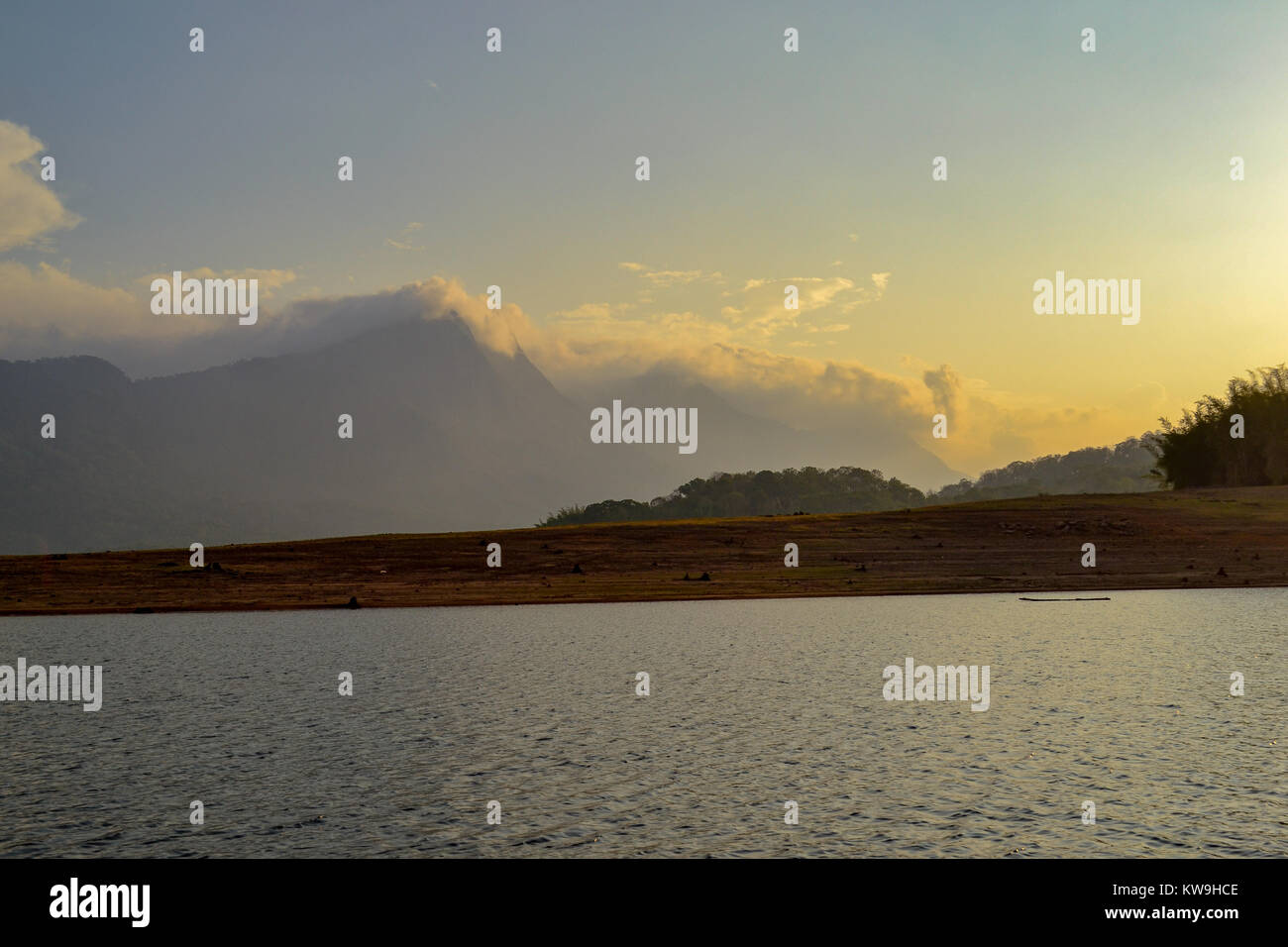 A view of Karimala Gopuram from Parambikulam reservoir Stock Photo - Alamy