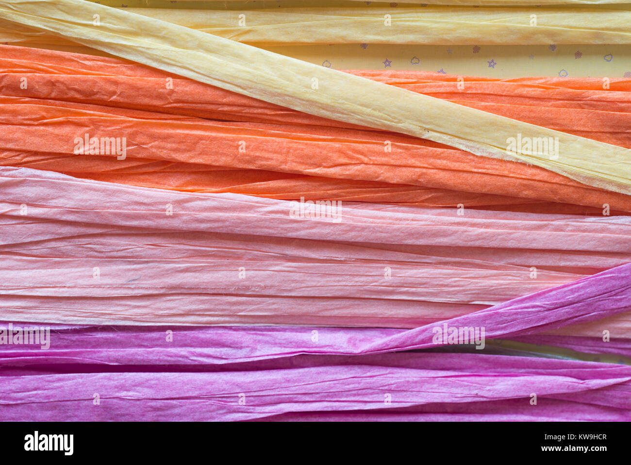 closeup to multicolored paper strings Stock Photo - Alamy