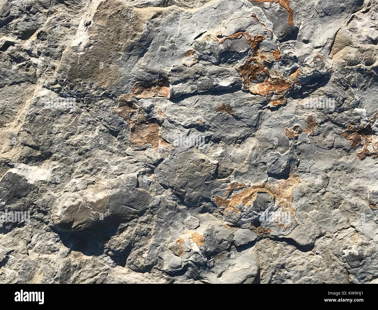Natrally textured stone surface Stock Photo - Alamy