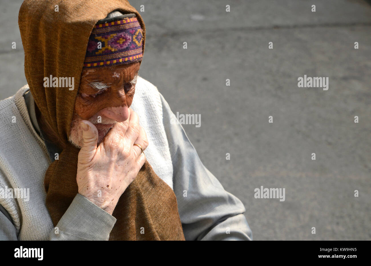 Old men sitting portrait outdoor in the street Old men sitting portrait ...