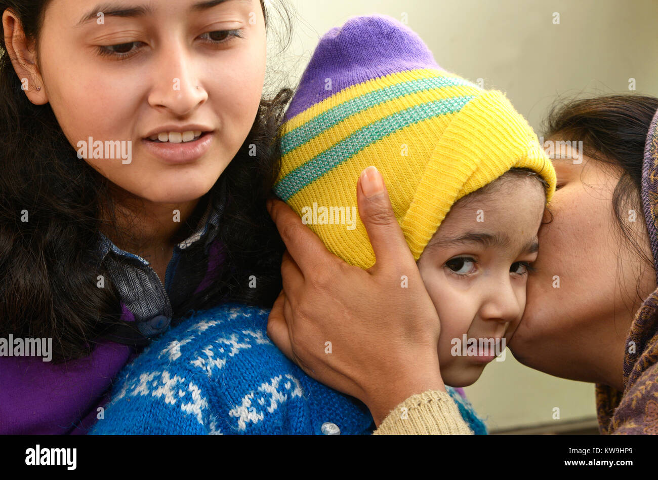 Cuddling with baby Stock Photo - Alamy