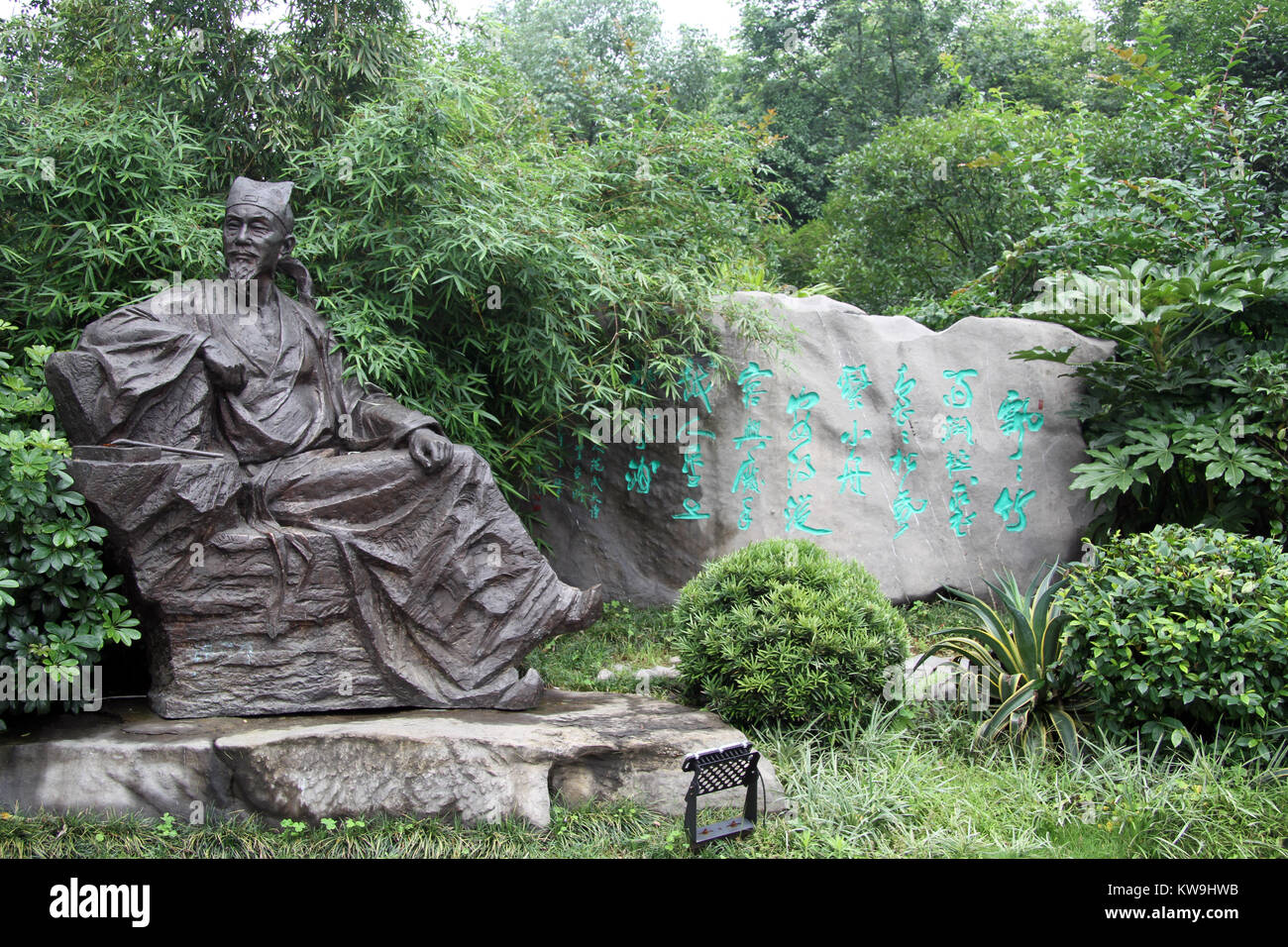 Stone statue of chionese poet in park, Guilin, China Stock Photo - Alamy