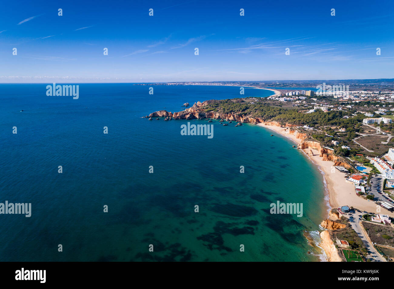 Aerial view of the coastline with beautiful beaches between Portimao ...