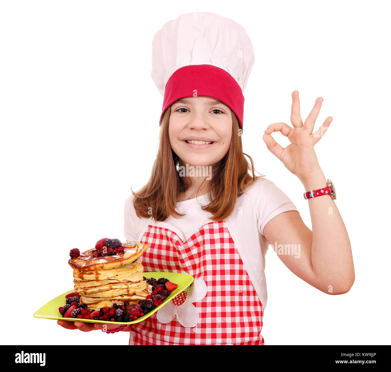happy little girl cook with pancakes and ok hand sign Stock Photo - Alamy