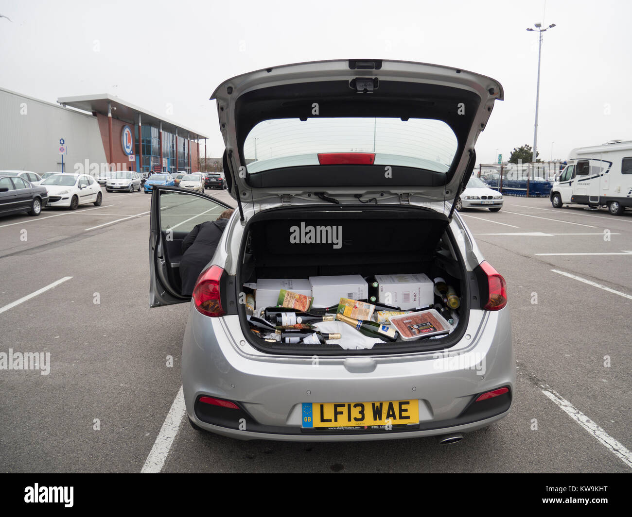 Car loaded with drink and food bought in supermarket in France on day ...