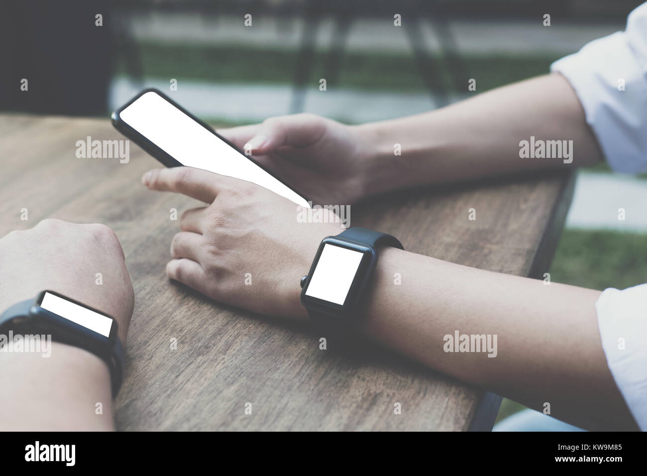 young man holding smartphone outdoor. social network communication ...