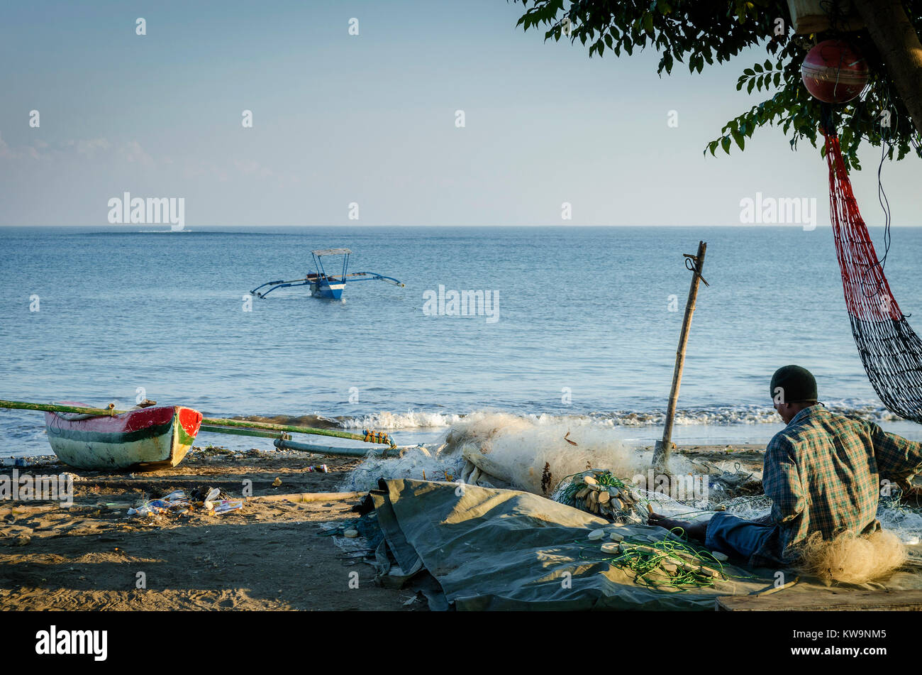 coast with traditional fishing boats on dili beach in east timor leste ...
