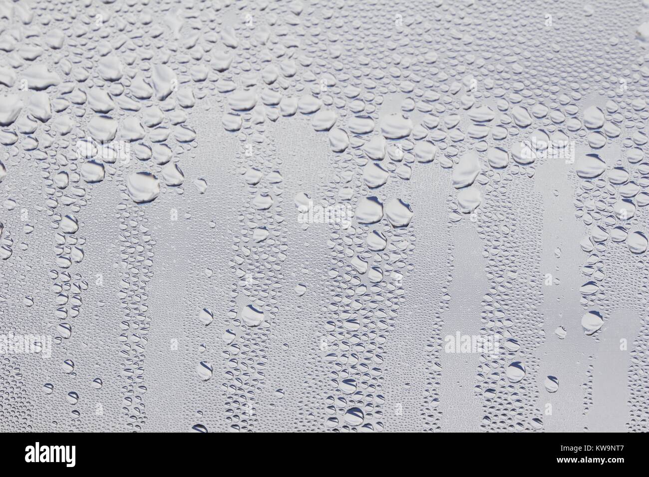 Macro image background of natural water condensation on a window pane ...