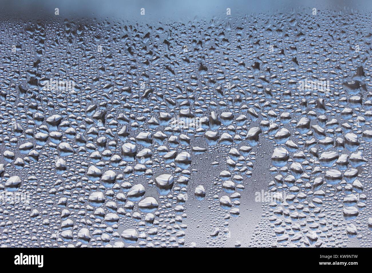 Macro image background of natural water condensation on a window pane ...
