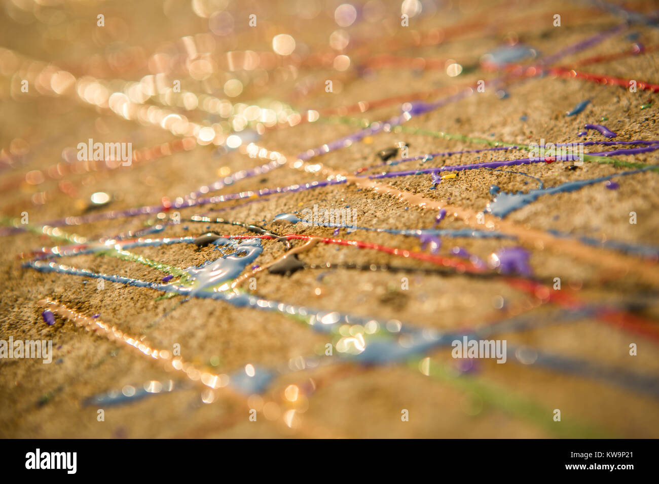 All the colors of rainbow swirled on and concrete using paint Stock ...
