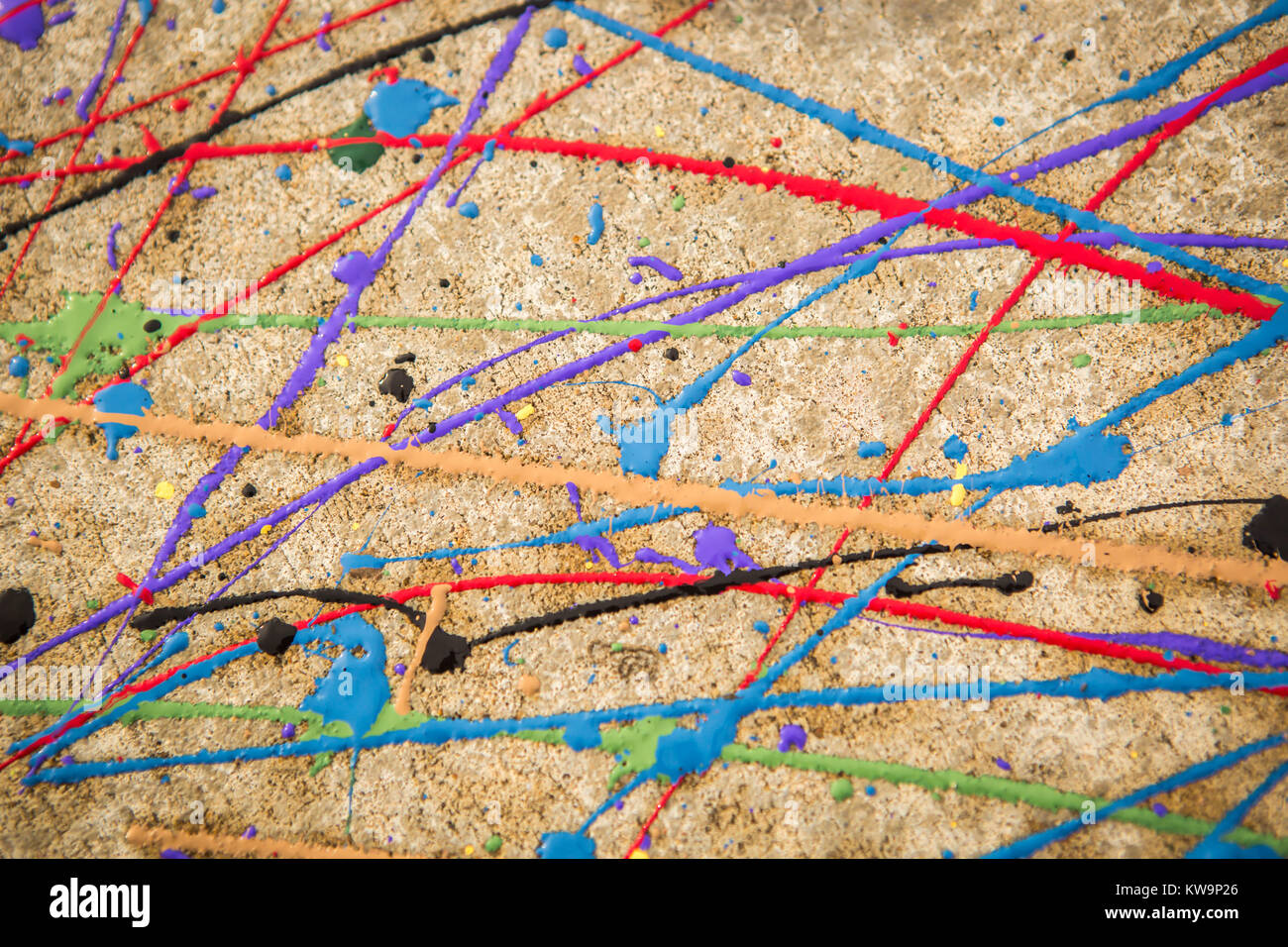 All the colors of rainbow swirled on and concrete using paint Stock ...