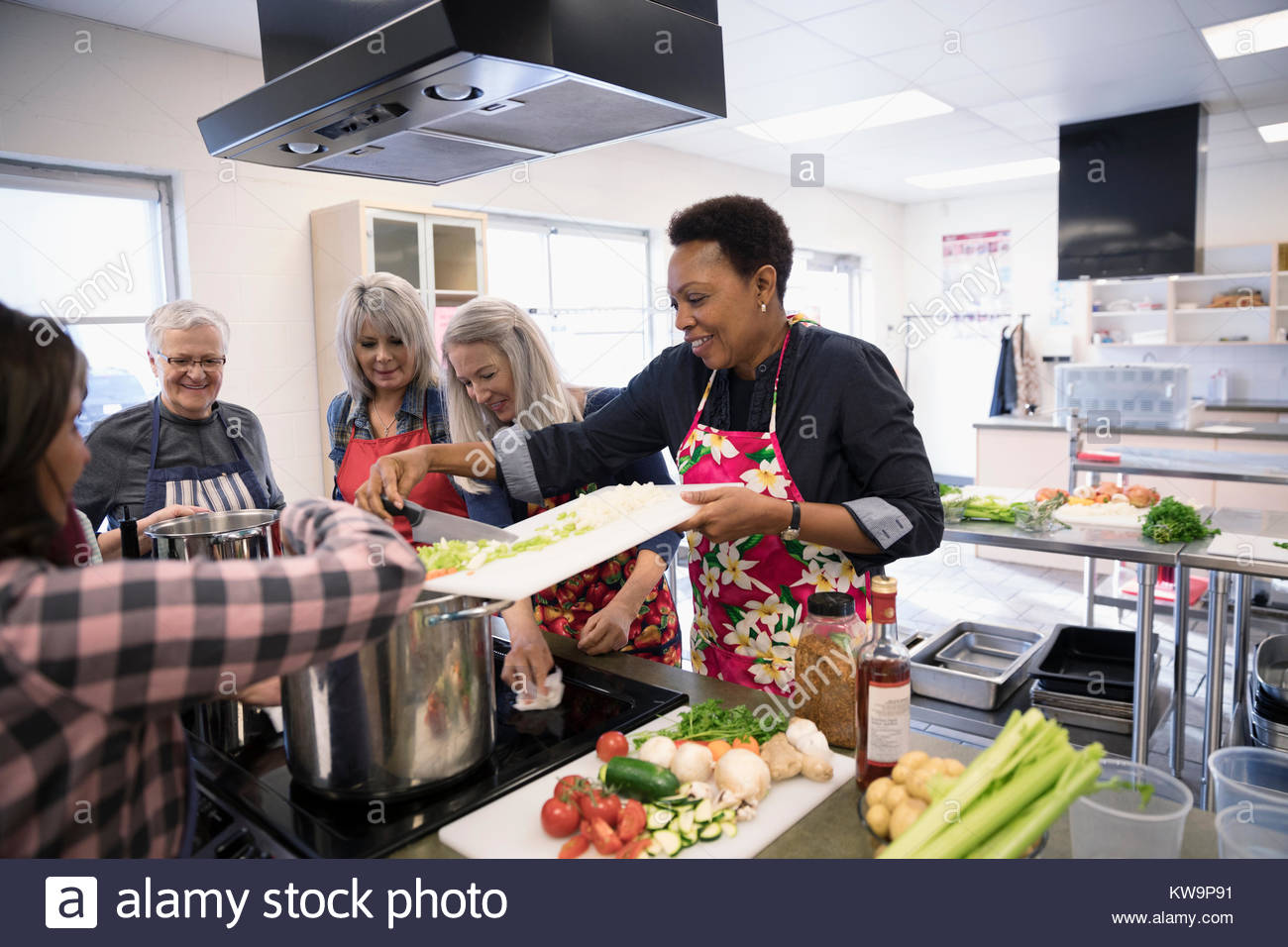 Woman pouring soup hi-res stock photography and images - Alamy