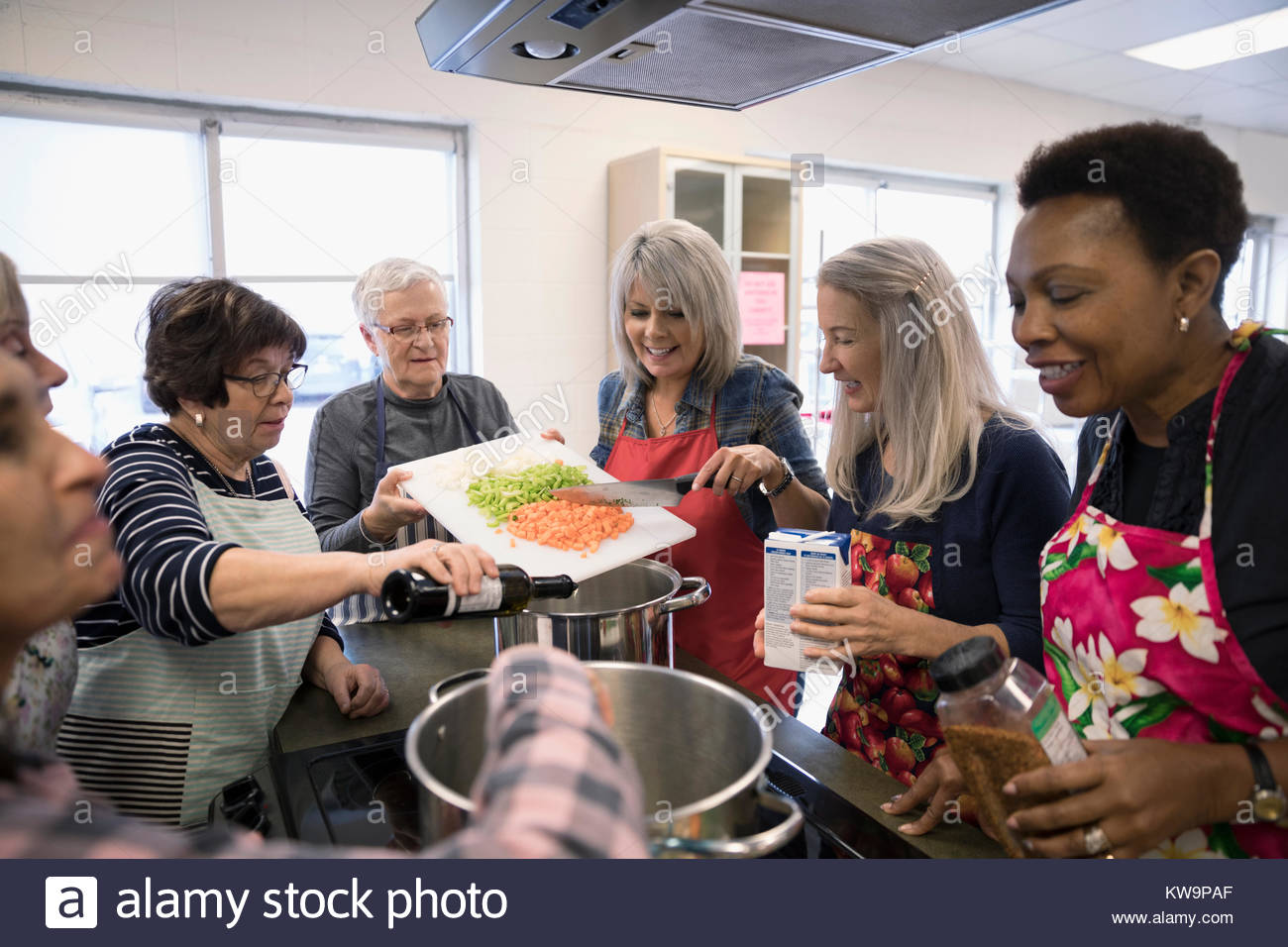 Helping elderly woman soup hi-res stock photography and images - Alamy
