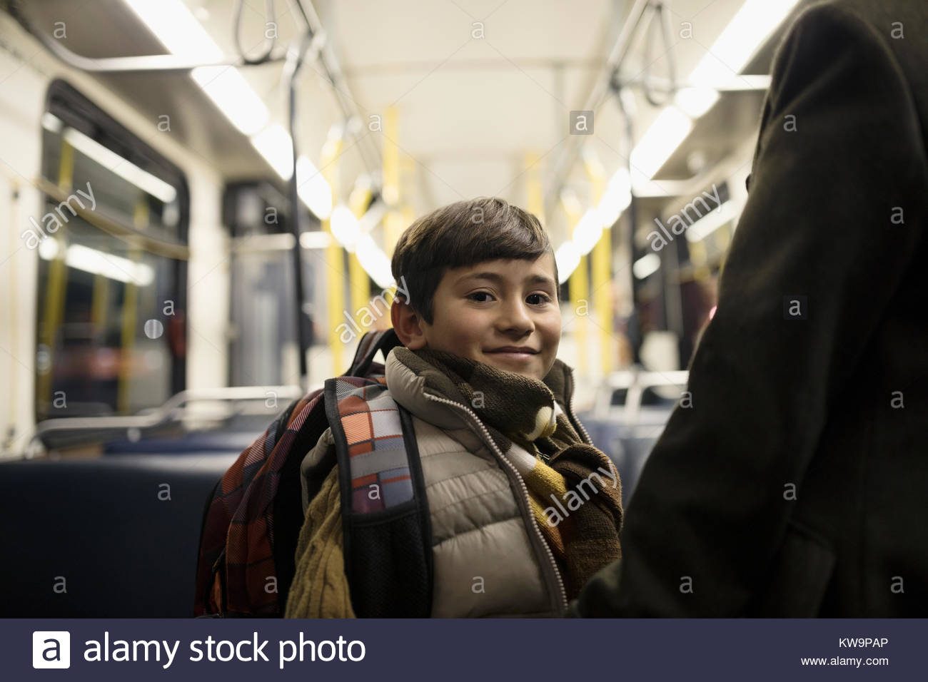 Portrait cute Latino boy riding bus Stock Photo - Alamy