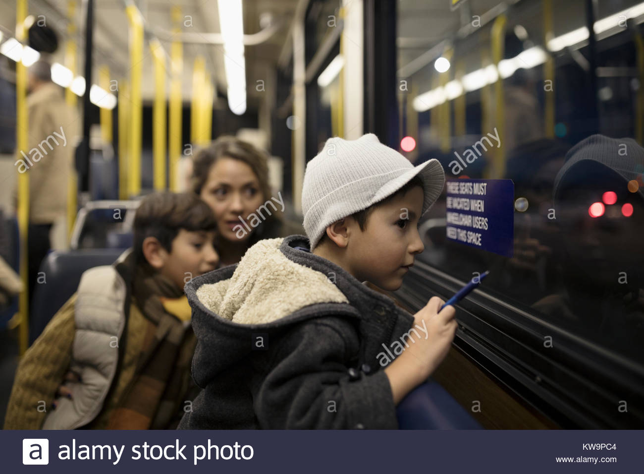 Boy looking out bus window hi-res stock photography and images - Alamy