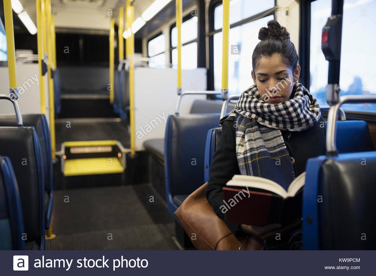 Woman commuter bus hi-res stock photography and images - Alamy