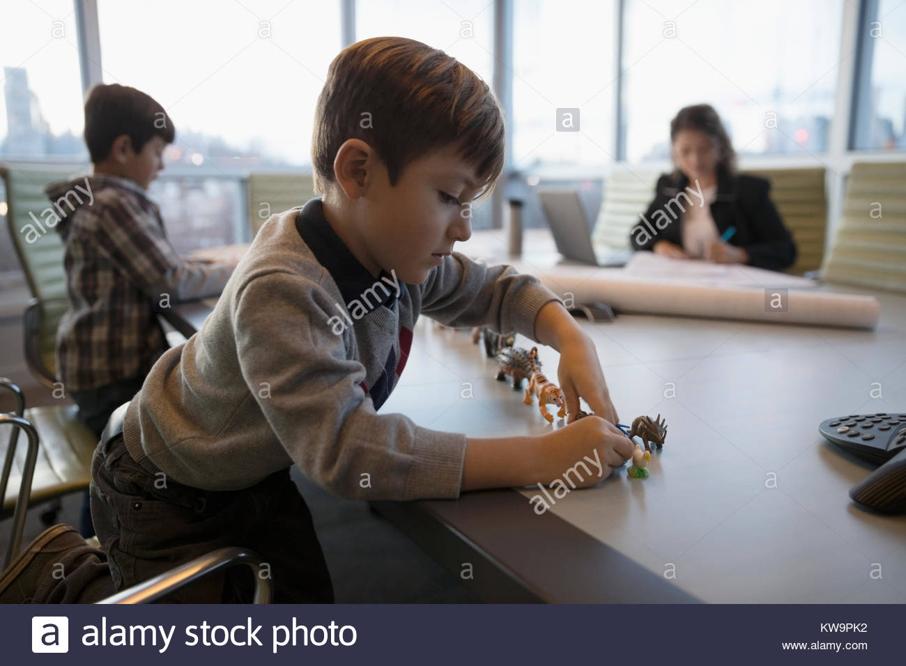 Boy playing toys table hi-res stock photography and images - Alamy