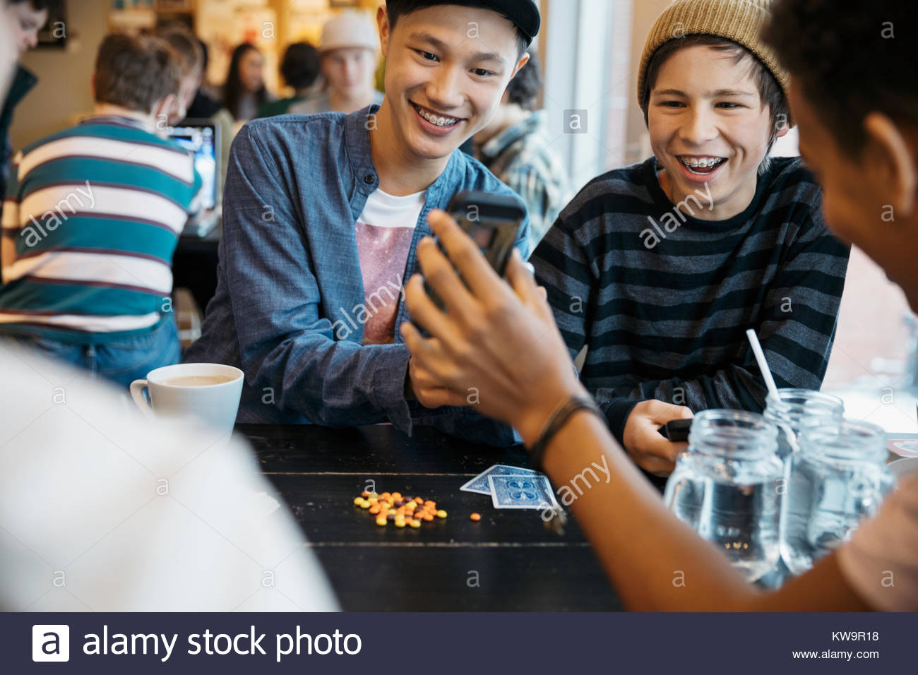 Boy group eating table hi-res stock photography and images - Alamy