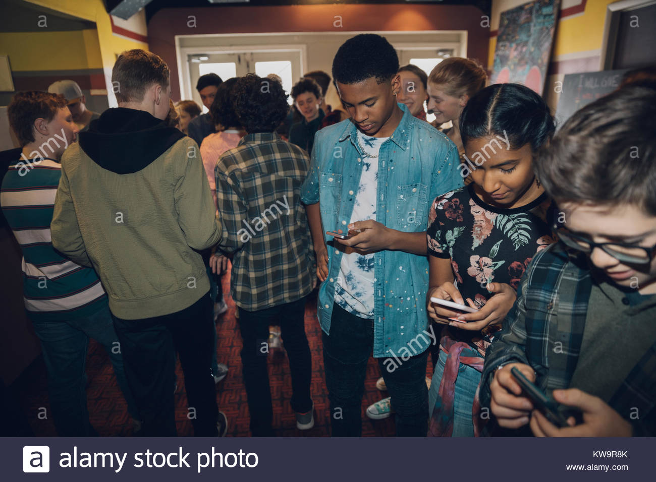 Black cell phone phones checking looking reading texting messaging hi-res stock photography and ...