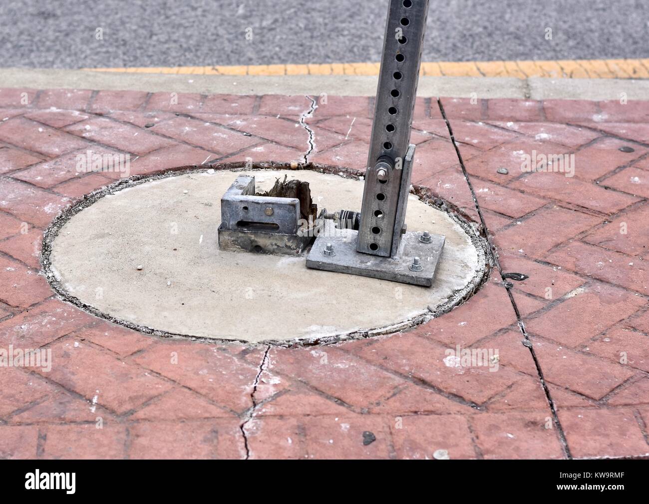 A new street sign post next to a broken sign post Stock Photo - Alamy
