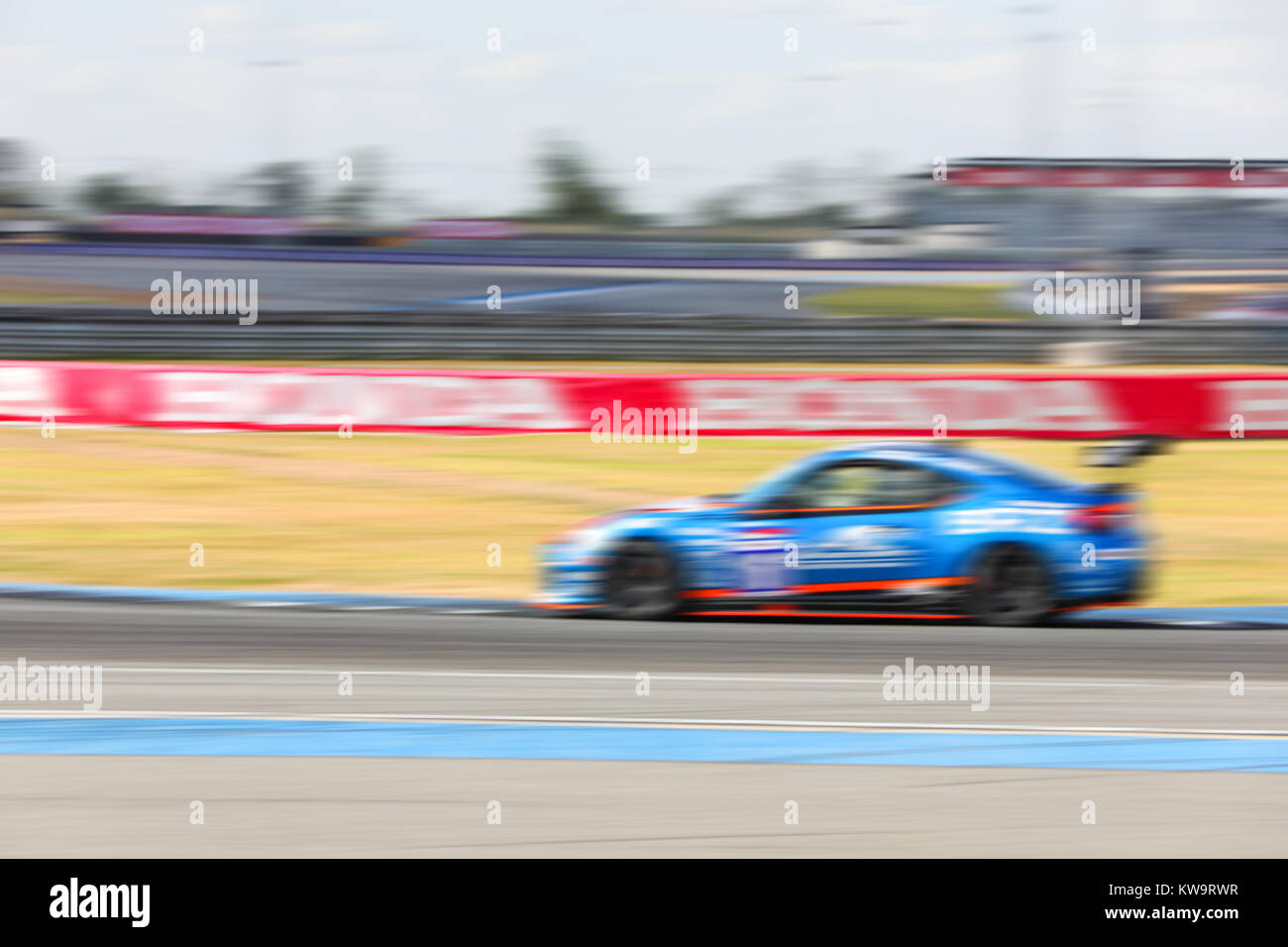 car racing on the road and track with motion blur and Radial blur Stock ...