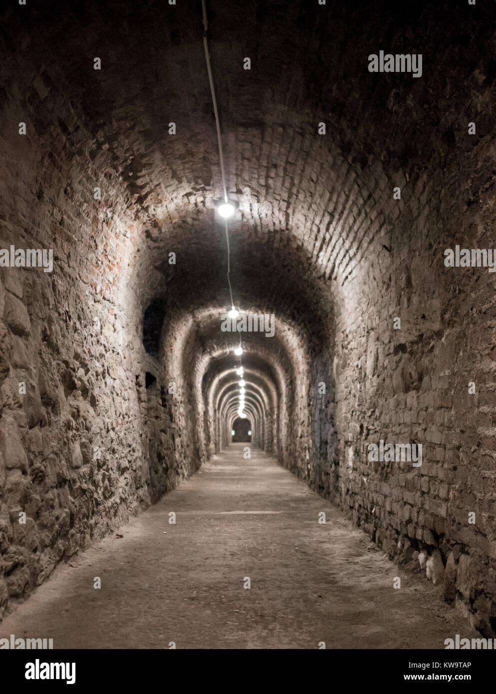 Long underground brick tunnel angle hi-res stock photography and images ...