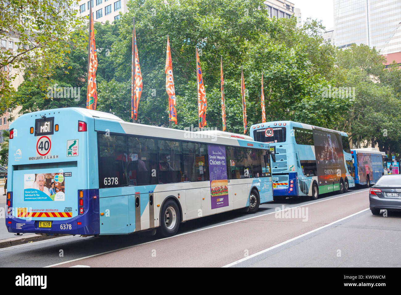Three Sydney buses stopped at Wynyard bus stops in the city centre ...