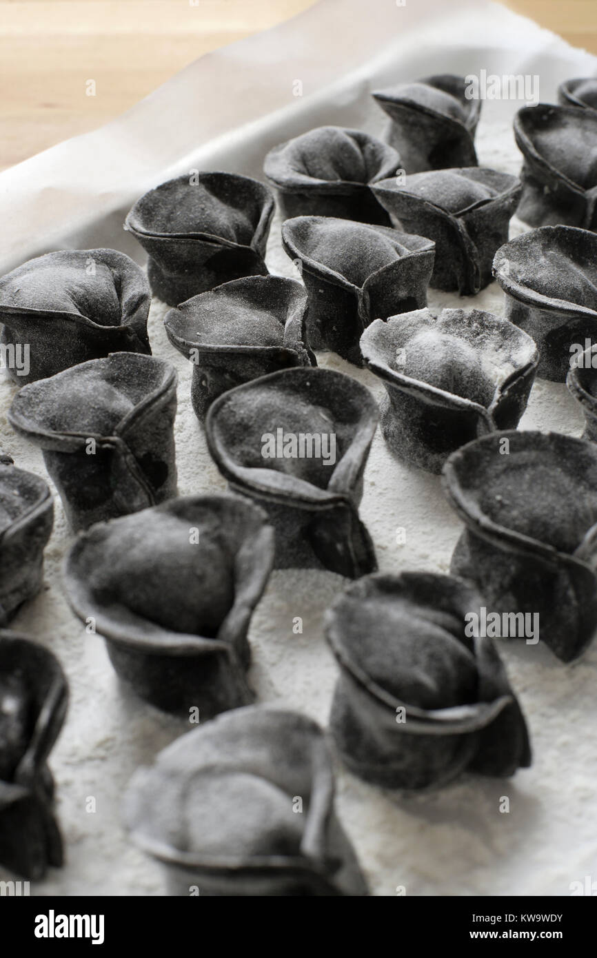 Photo of homemade pasta before cooking. Made with black ink from ...
