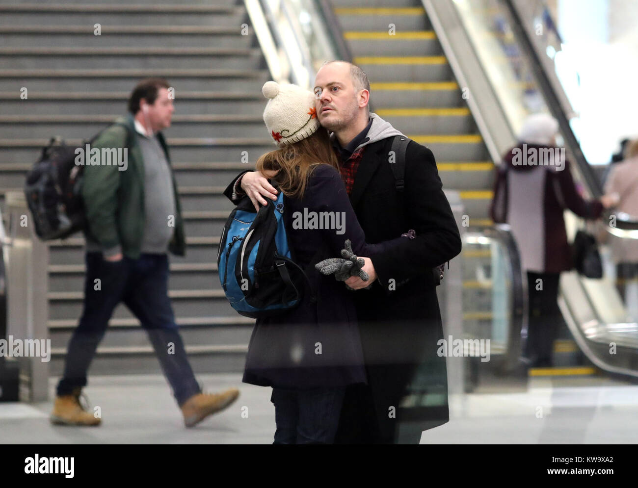 Pic shows: Consoling each other over higher rail fares? This couple ...
