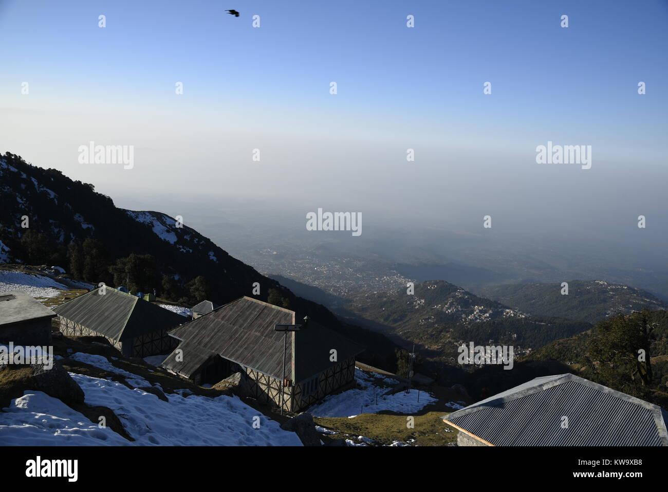 Scenic Triund mountains camps covered by crystal white snow in December ...