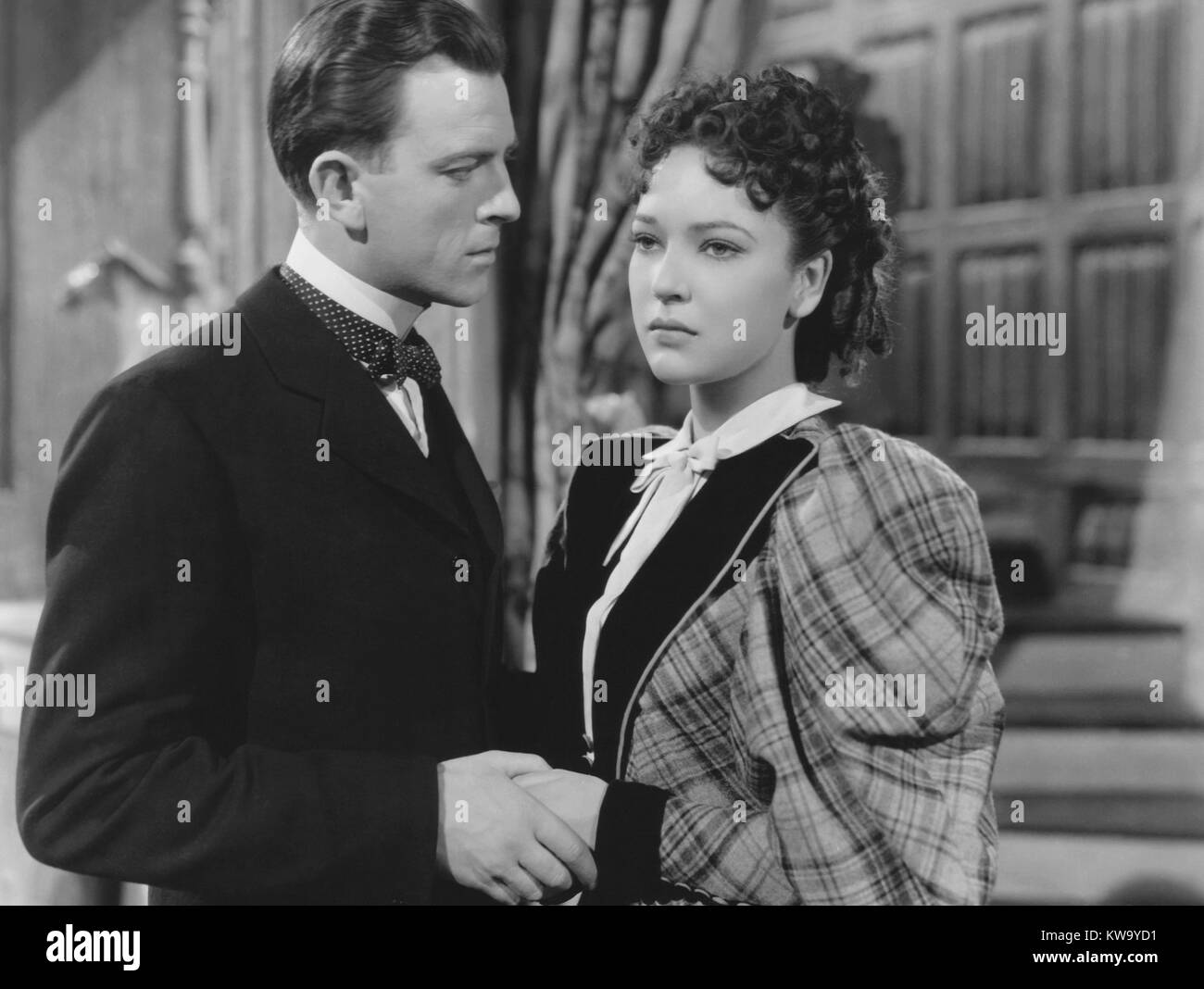 FOUR FEATHERS, from left: John Clements, June Duprez, 1939 Stock Photo ...