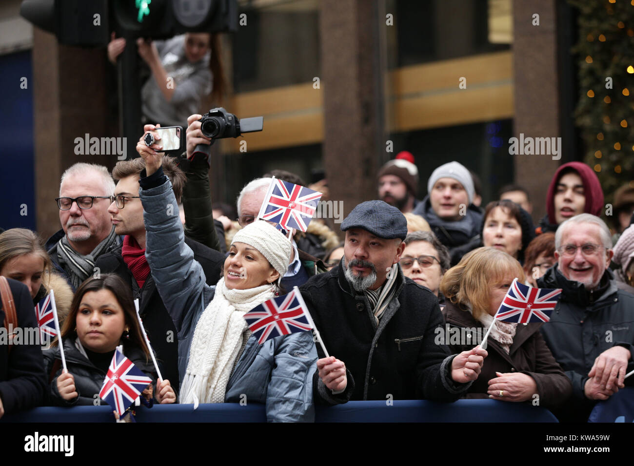 The crowd watch the London New Year's Day Parade pass by Stock Photo ...
