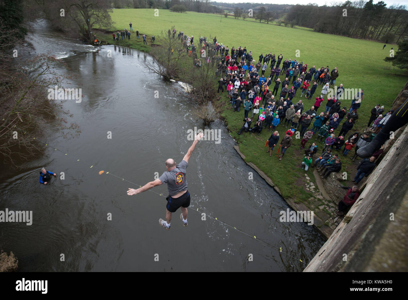 A man takes part in the Mappleton Bridge Jump, an annual unofficial ...