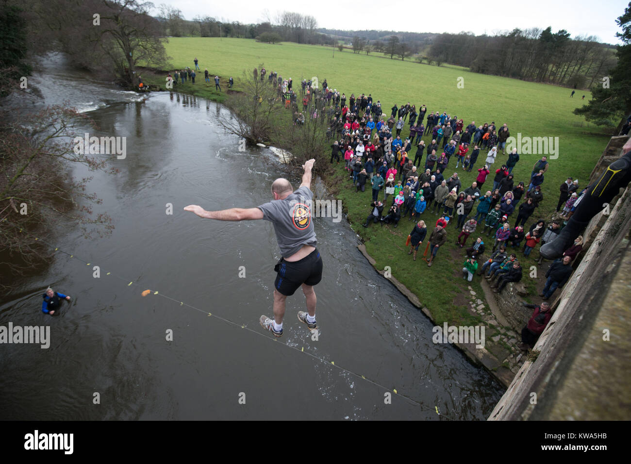 A man takes part in the Mappleton Bridge Jump, an annual unofficial ...