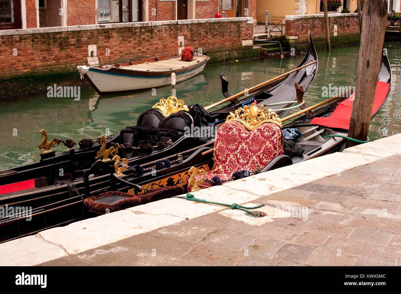 typical gondola in a canal of Venice, traditional boat Stock Photo - Alamy