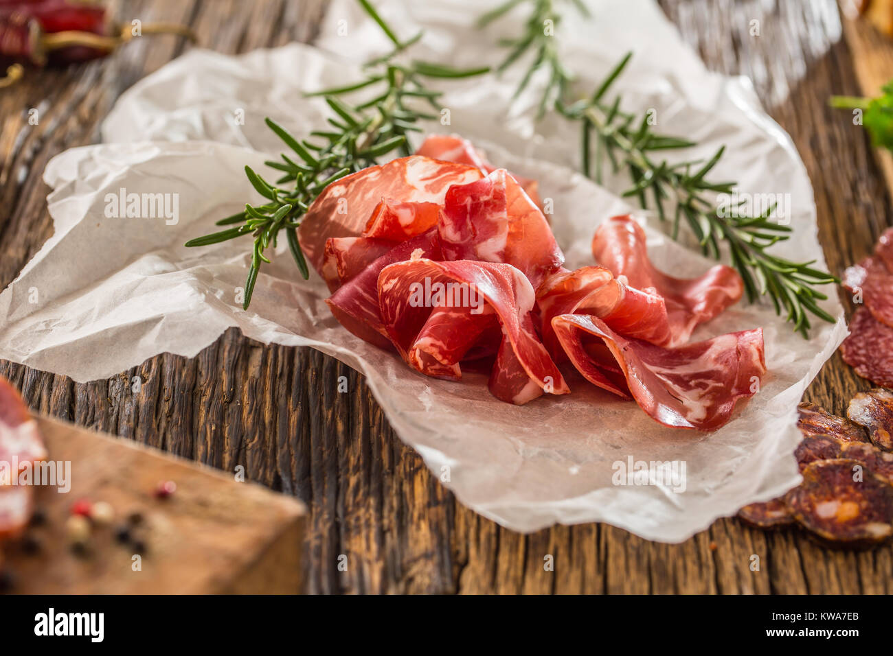 Coppa di Parma ham with fresh rosemary. Mediterranean food.Italian ...