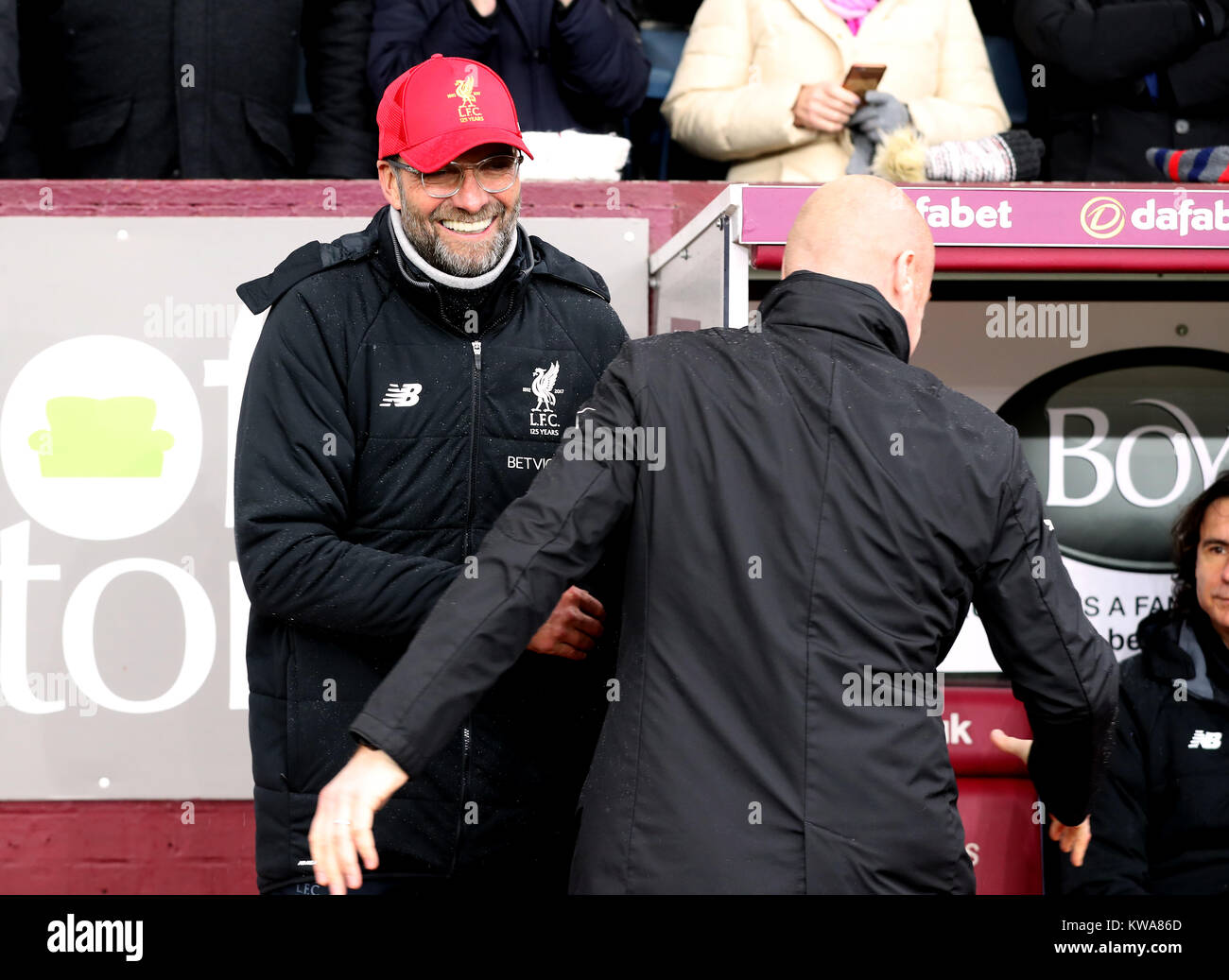 Liverpool manager Jurgen Klopp (left) and Burnley manager Sean Dyche ...
