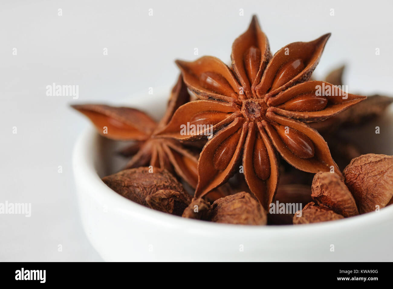 Star anise in white bowl hi-res stock photography and images - Alamy