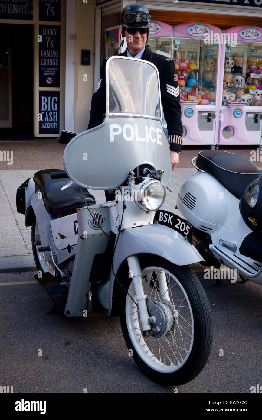 Man dressed as historical policeman with his motorcycle Stock Photo - Alamy