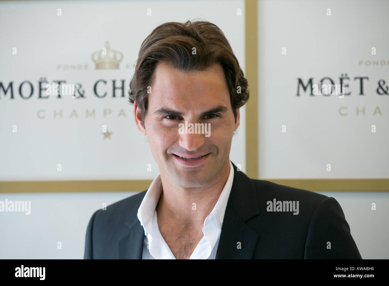 Roger federer arrives moet chandon hi-res stock photography and images ...