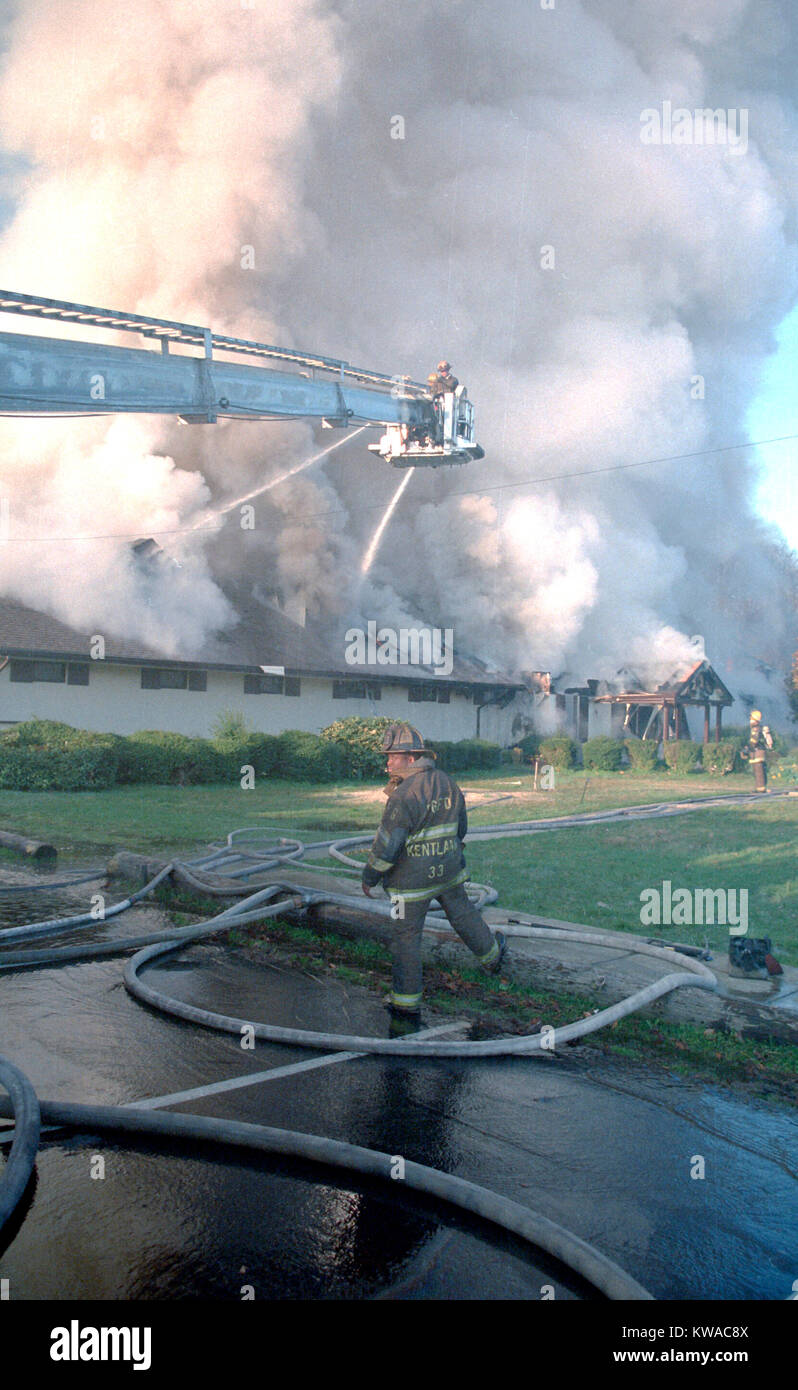 Firefighters fighting a multi alarm fire at a community center Stock ...