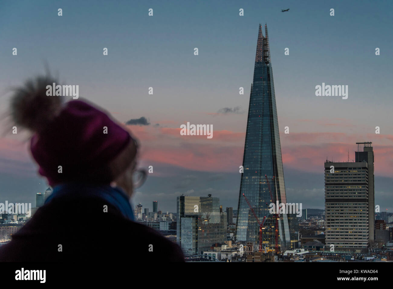 Woman bobble hat uk buildings hi-res stock photography and images - Alamy
