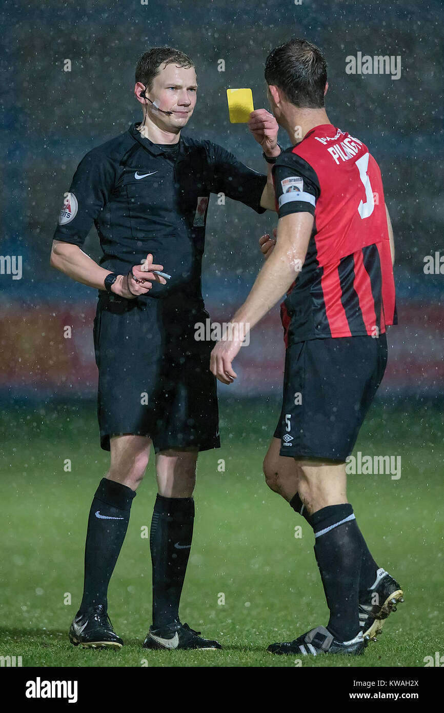 Halifax, UK. 01st Jan, 2018. Caution: Referee Peter Wright shows a ...