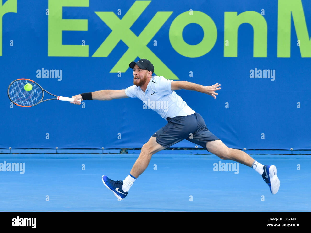 Doha, Qatar. 1st Jan, 2018. Dudi Sela of Israel hits a return during ...