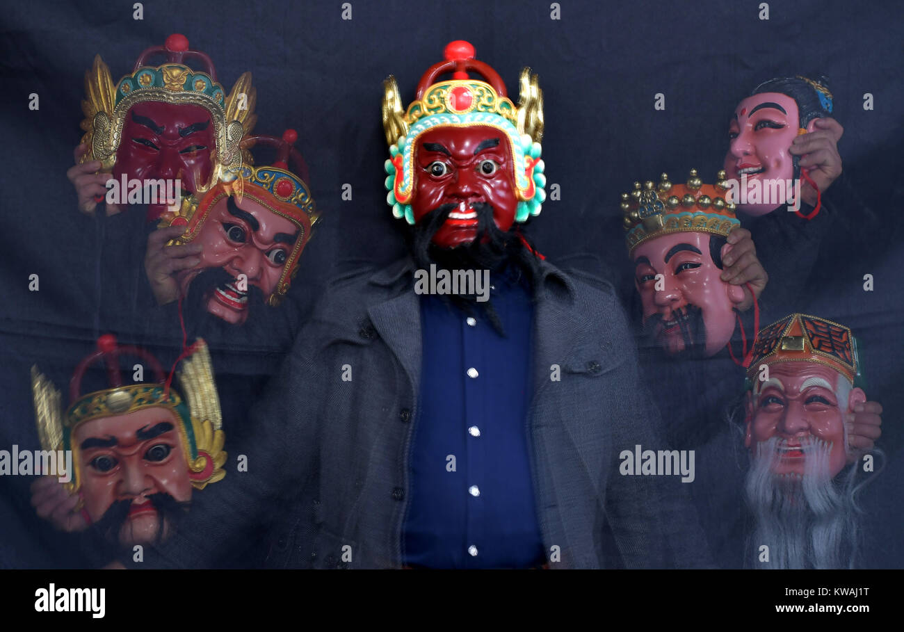 (180102) -- NANCHANG, Jan. 2, 2018 (Xinhua) -- Peng Guolong shows his ...