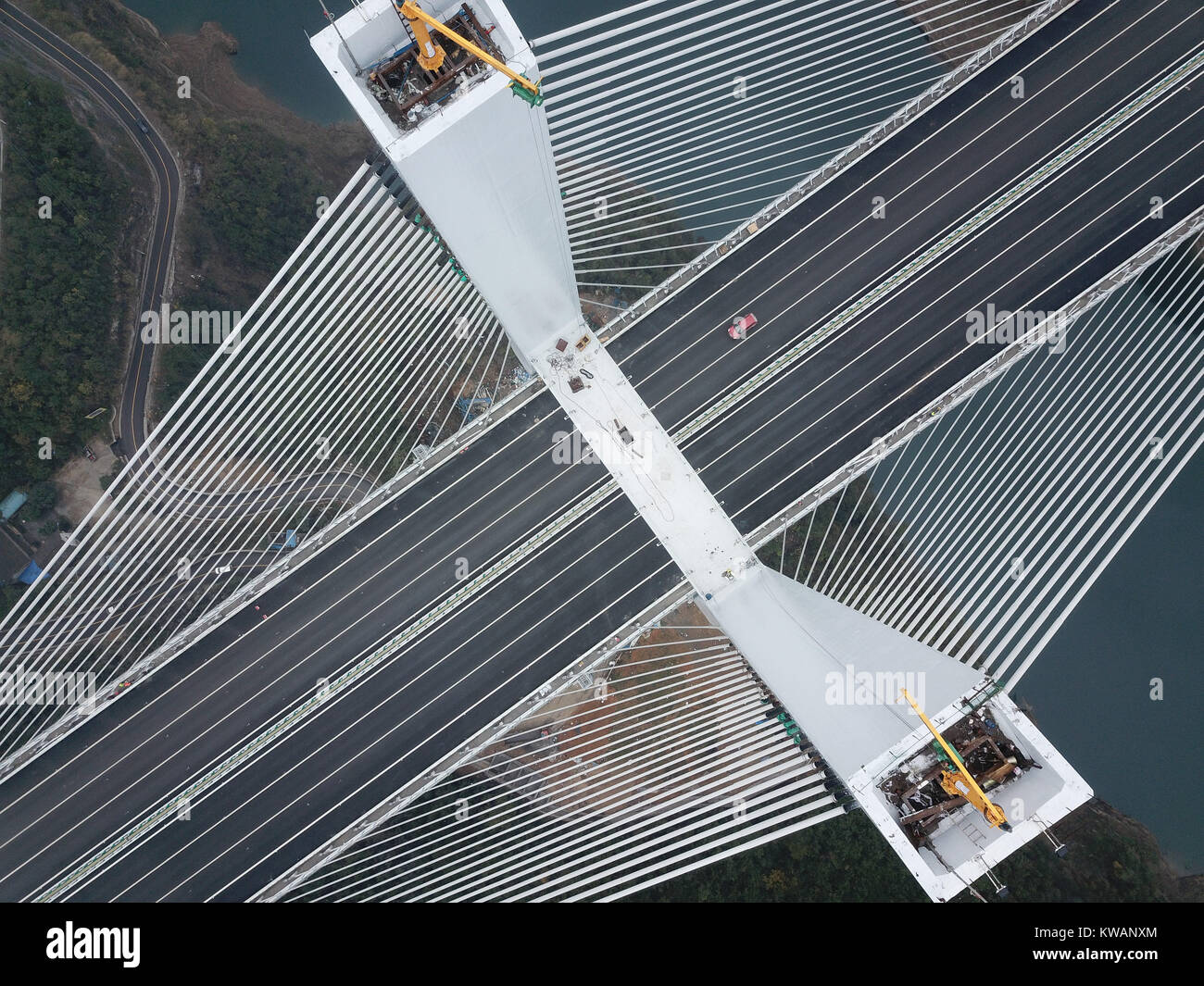 Guiyang. 2nd Jan, 2018. A vehicle runs on a bridge of the new highway ...