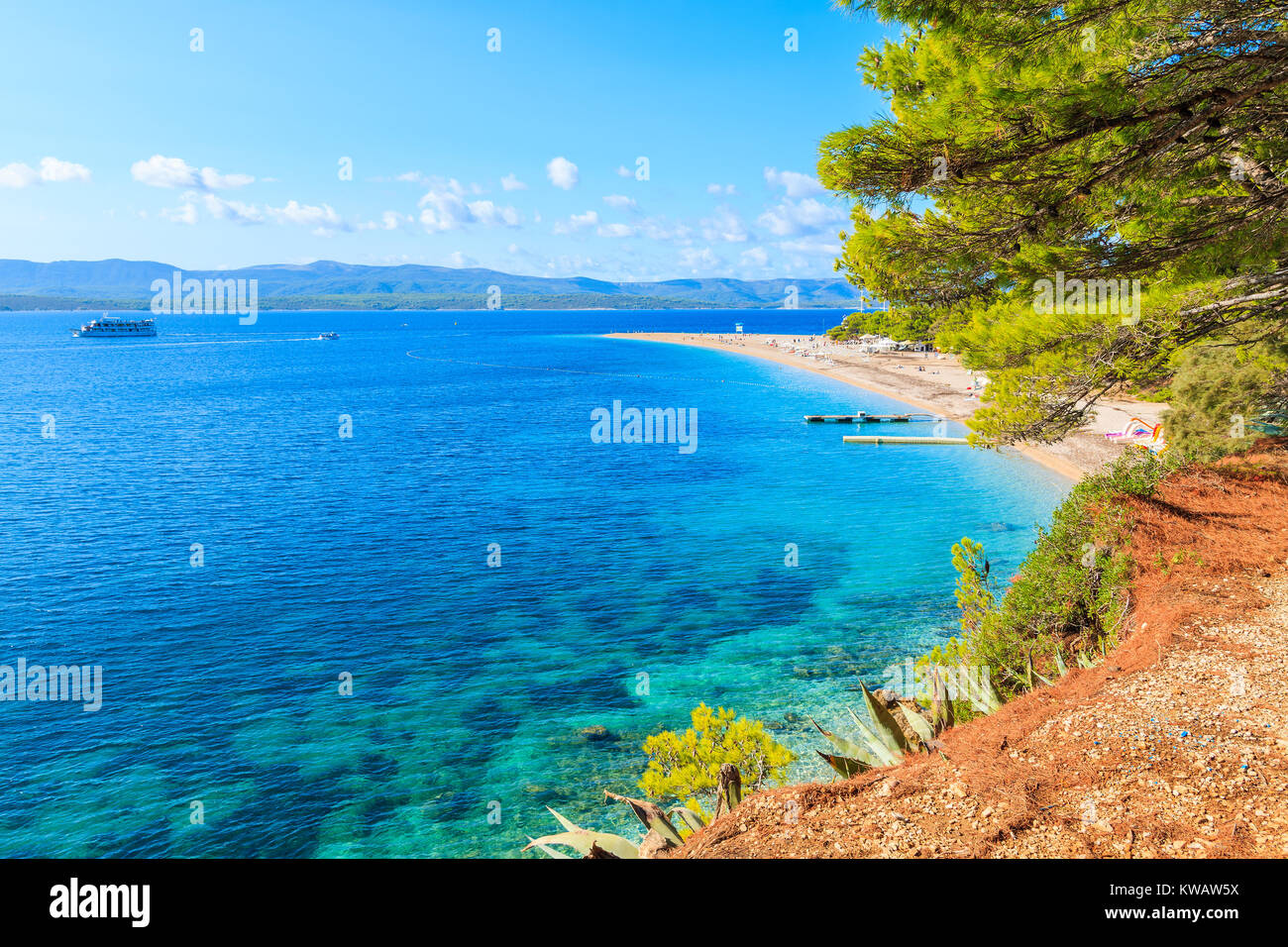 View of famous Zlatni Rat beach with beautiful sea water in Bol town ...